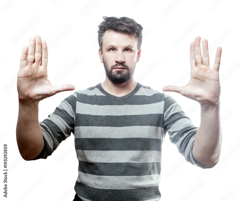 Magic trick. Photo portrait of a young european man showing both of his ...