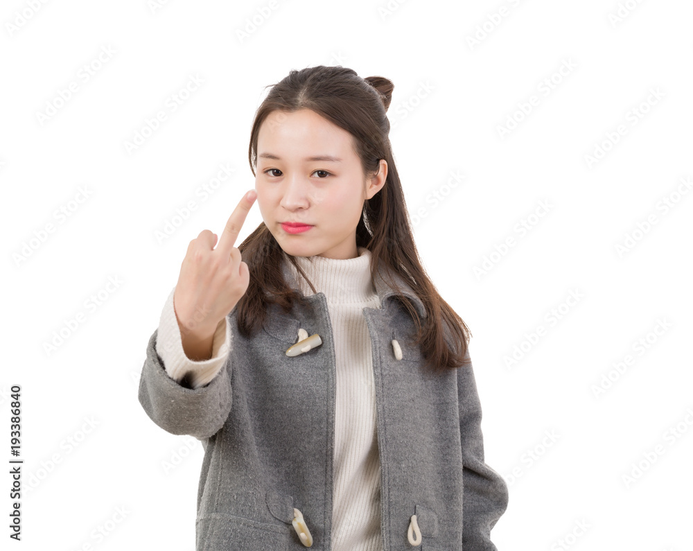Serious and angry young woman showing middle finger, showing her anger ...