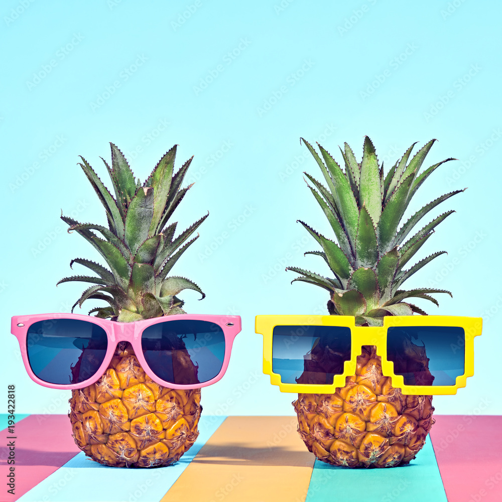 Two Hipster Fruits in Trendy Sunglasses, on Beach. Tropical Pineapple Couple. Bright Summer ...