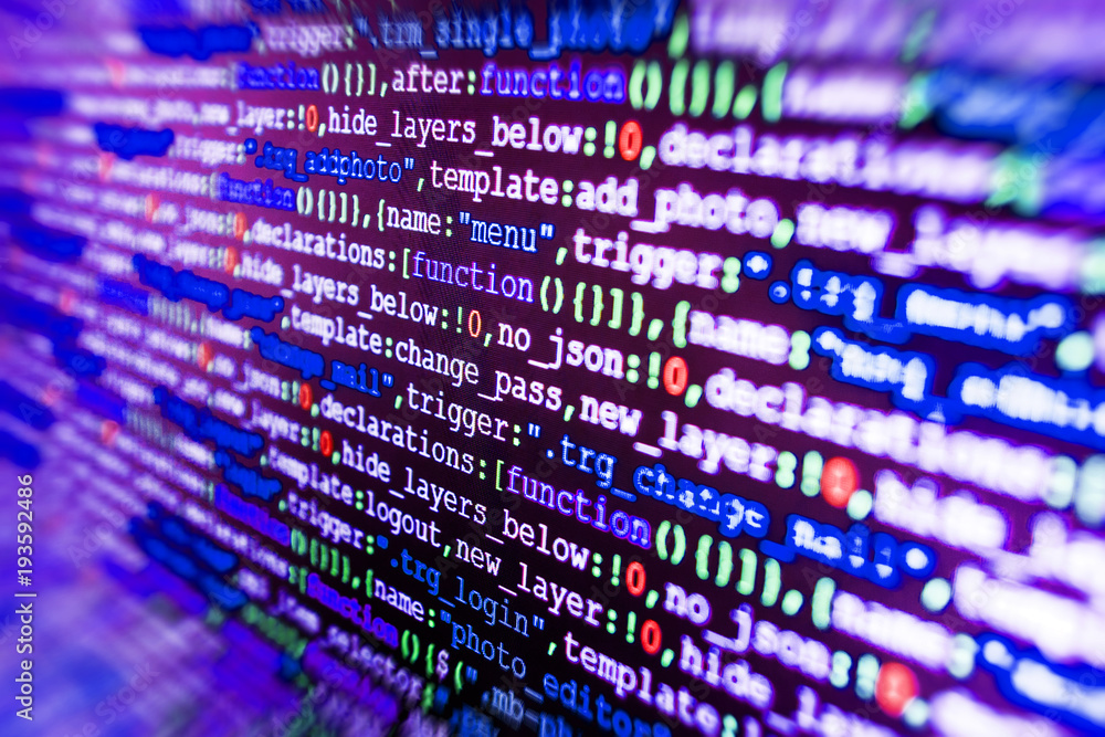 IT business company. Writing programming code on laptop. Future technology creation process ...