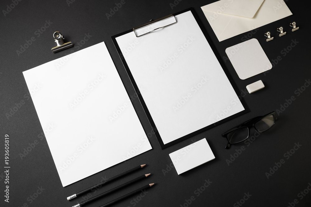 Blank stationery set on black paper background. Template for branding ...