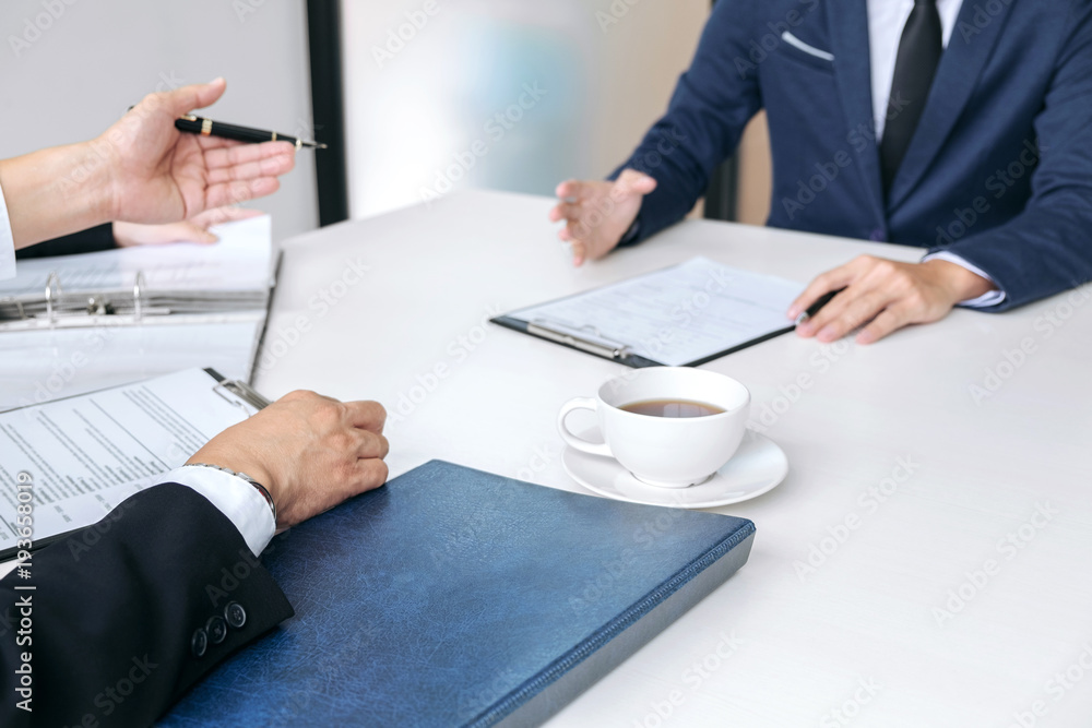 Interviewer or Board reading a resume during a job interview, Employer ...