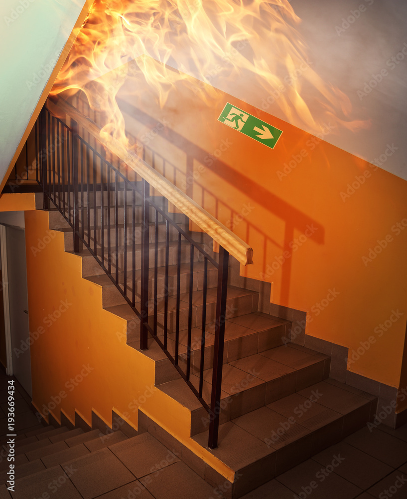 fire on the staircase in the building Stock Photo | Adobe Stock