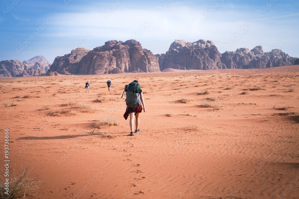 Two Friends Walking In The Desert