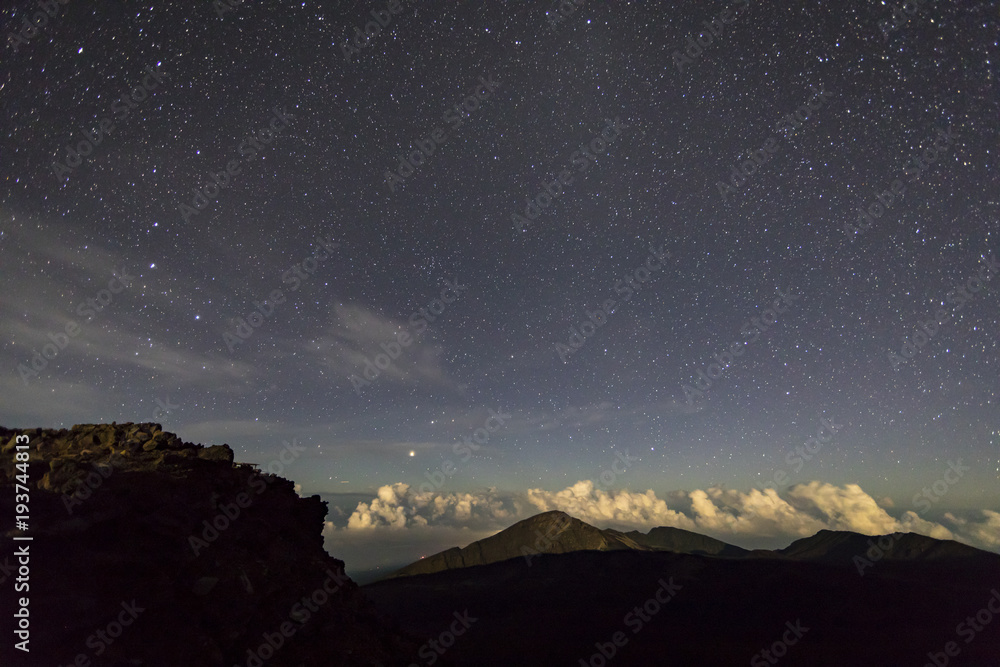 view of the starry sky and the milky way galaxy taken from the summit ...