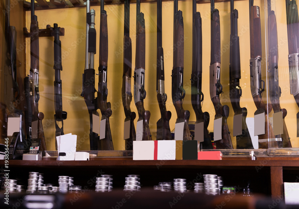 Gun shop interior with rifles Stock Photo | Adobe Stock