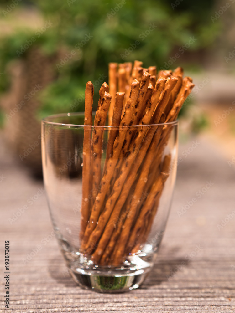 Pretzel sticks in glass Stock Photo | Adobe Stock