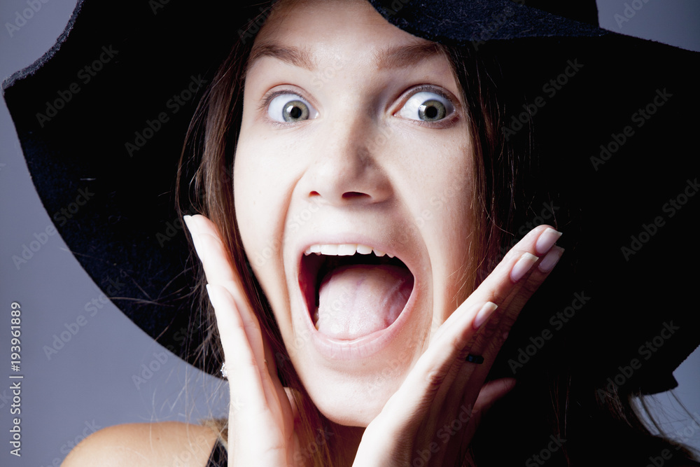 Portrait of young frustrated woman asking for help as symbol of fear ...