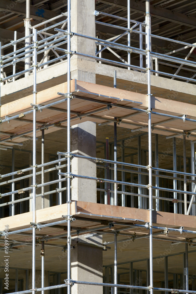 Scaffold around the outside of a new build property Stock Photo | Adobe ...