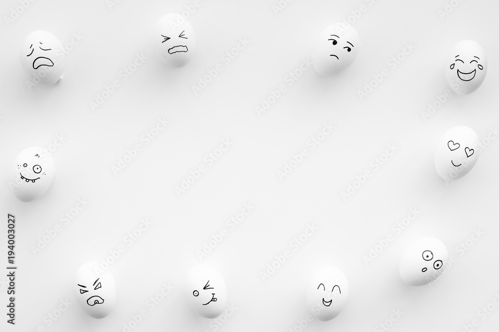 Basic emotions concept. Faces drawn on eggs. Happy, smile, sad, angry ...