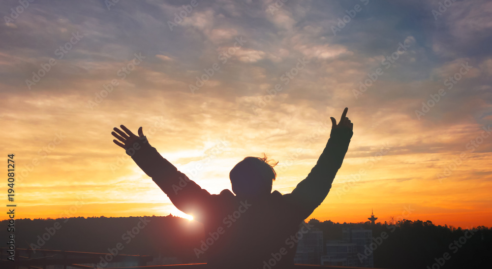 Praise and worship concept: Silhouette human raising hands to praying ...