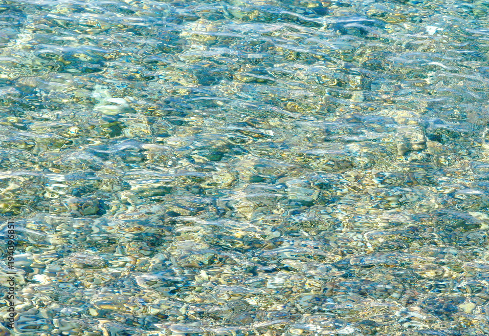 Texture of transparent crystal clear sea water and pebbles, summer sea ...