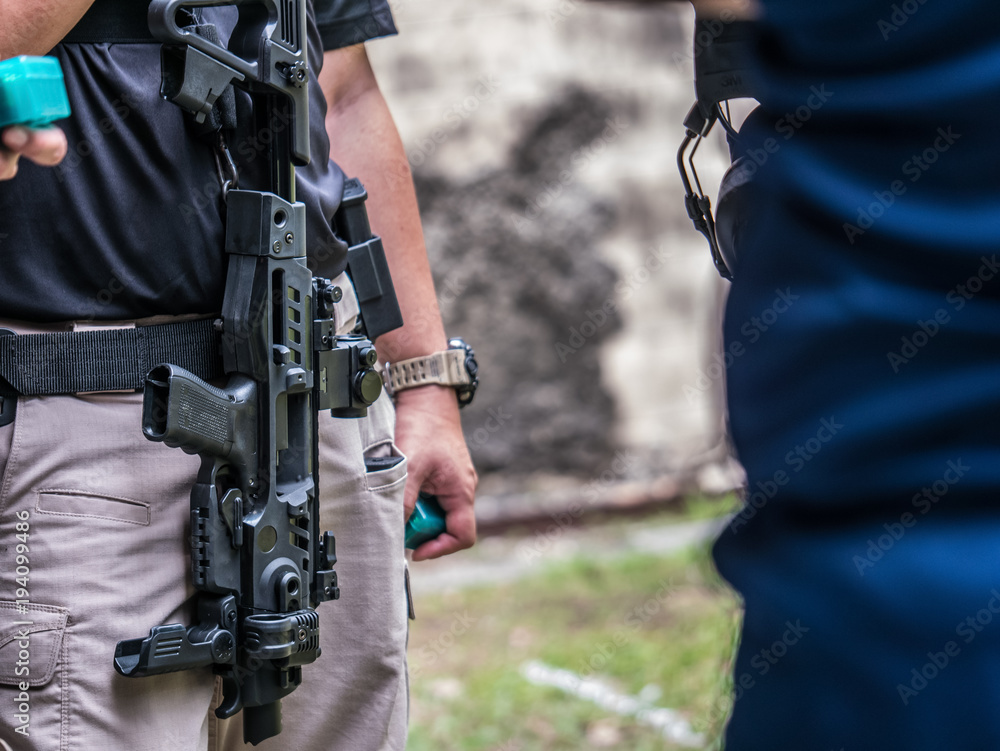 law enforcement force with submachine gun Stock Photo | Adobe Stock