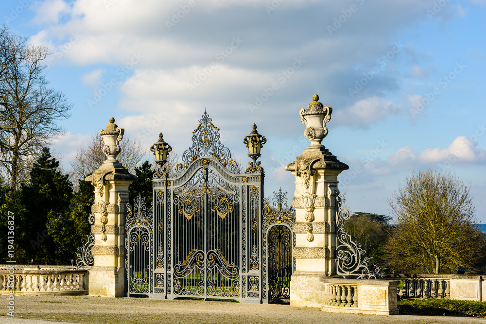 The majestic main entrance gate of the Noisiel public park, in the ...