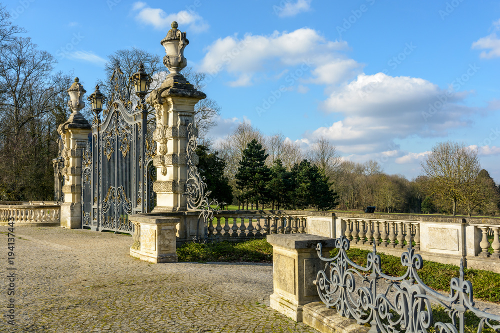 The majestic main entrance gate of the Noisiel public park, in the ...