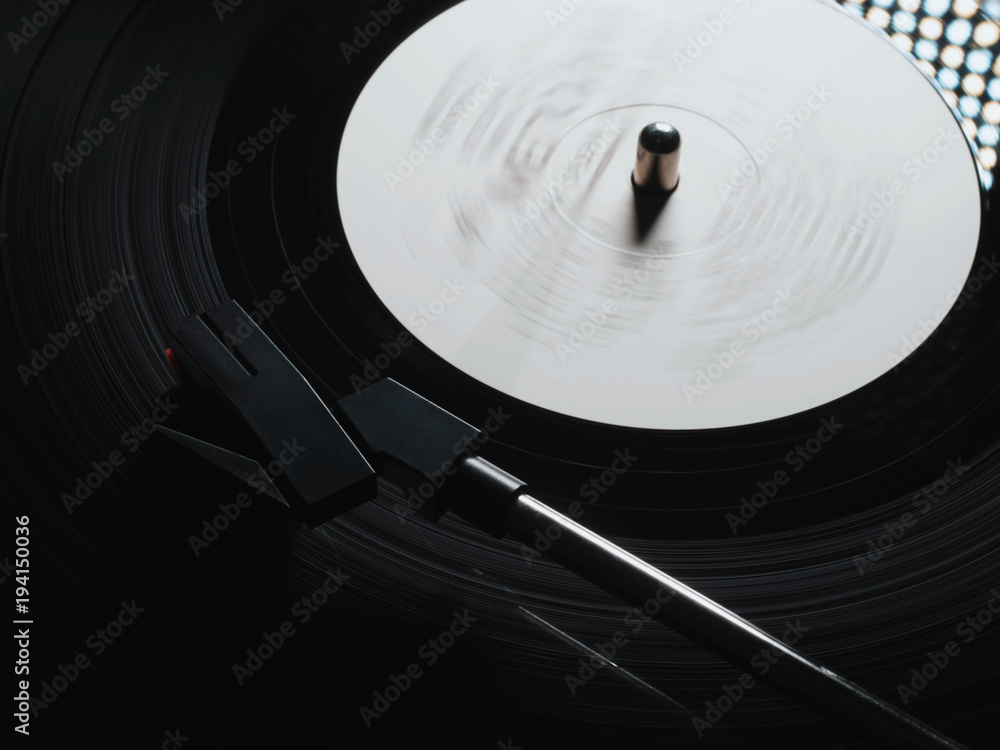 Cinemagraph, retro vinyl player. Recorder on turntable, viewed from ...