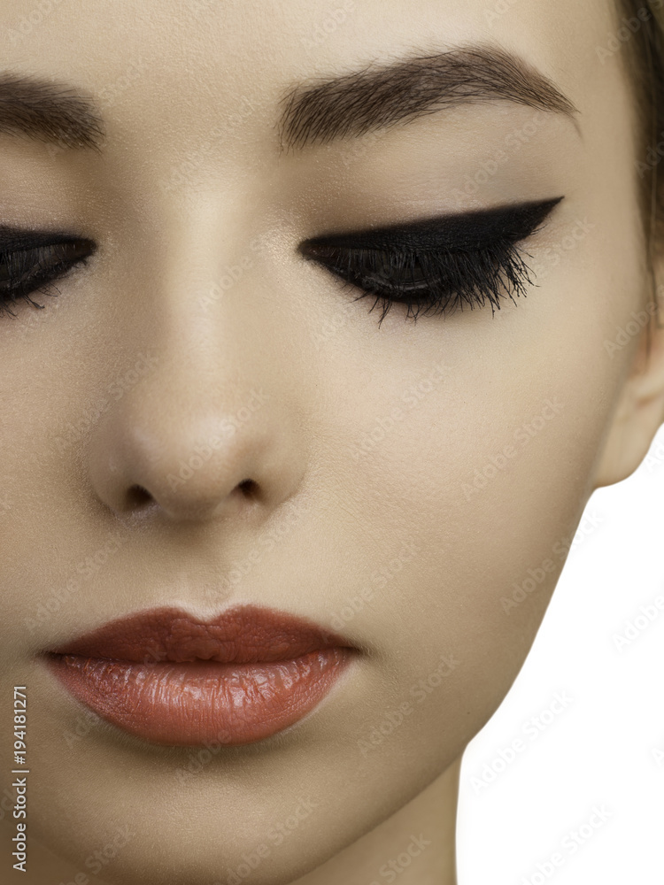 Beautiful face of model of the woman with bright cosmetics of a charm ...