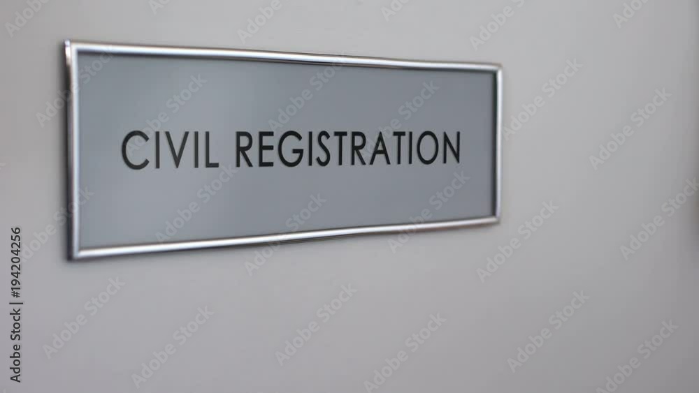 Civil registration office door, hand knocking closeup, marriage ...
