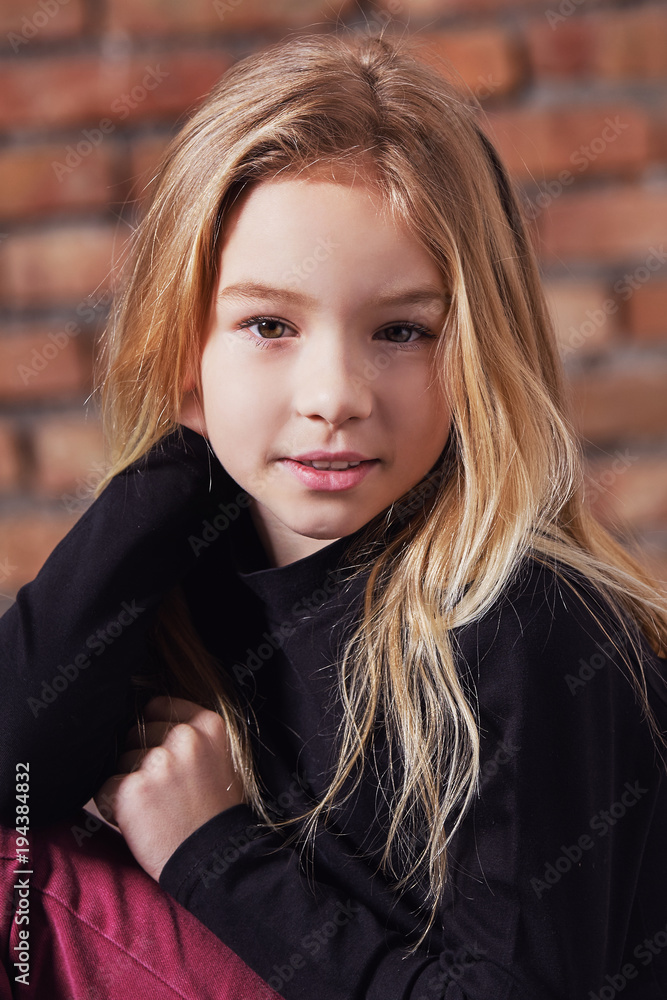 closeup portrait fashion kid girl. Stylish young model child blond hair ...