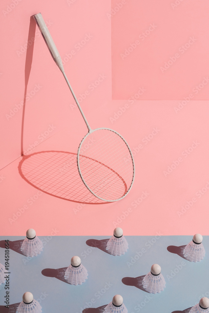 badminton rackets on pink and blue background Stock Photo | Adobe Stock