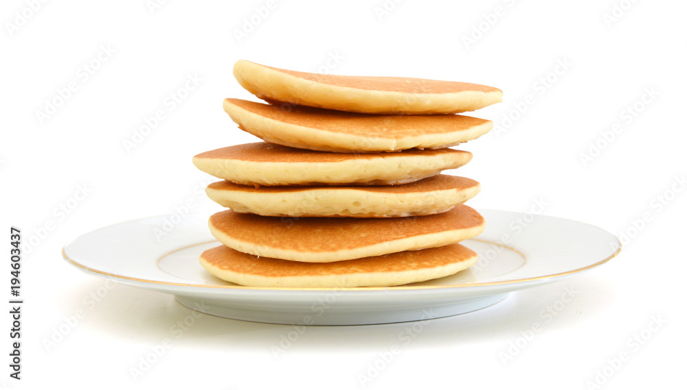 A stack of plain pancakes in plate on a white background. Stock Photo ...