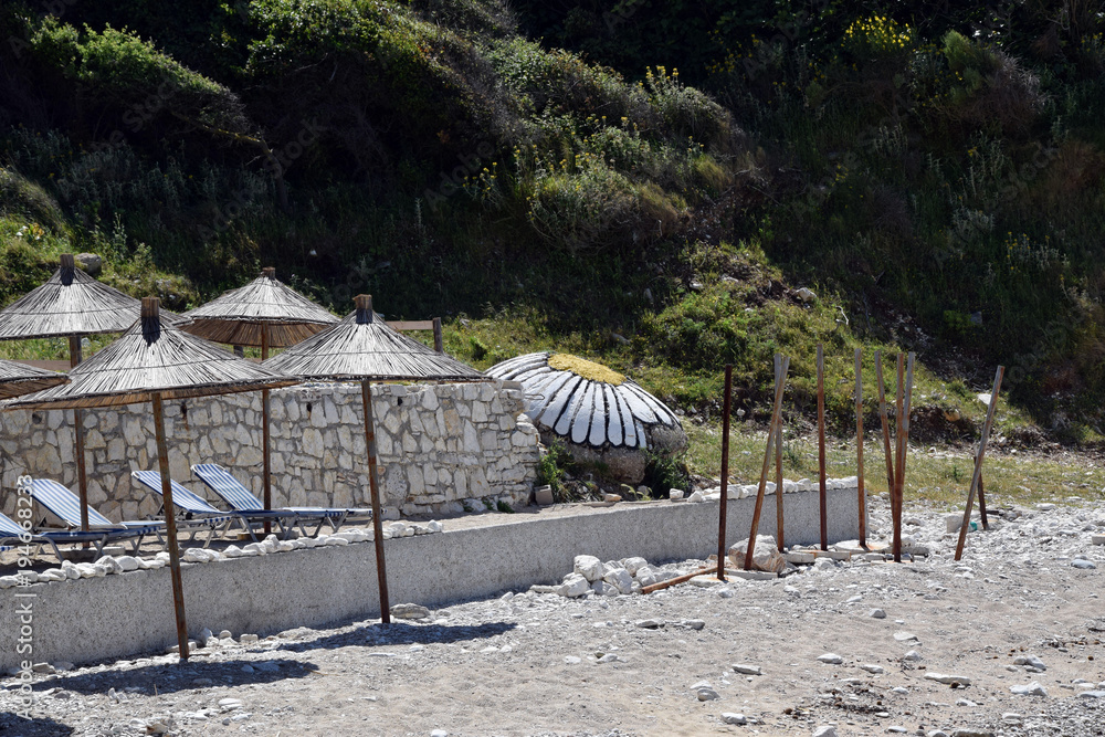 Old military bunker painting with daisy theme. Monastery beach (Plazhi ...