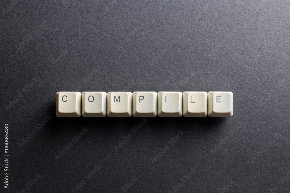 Word compile made using computer keyboard buttons on a black background ...