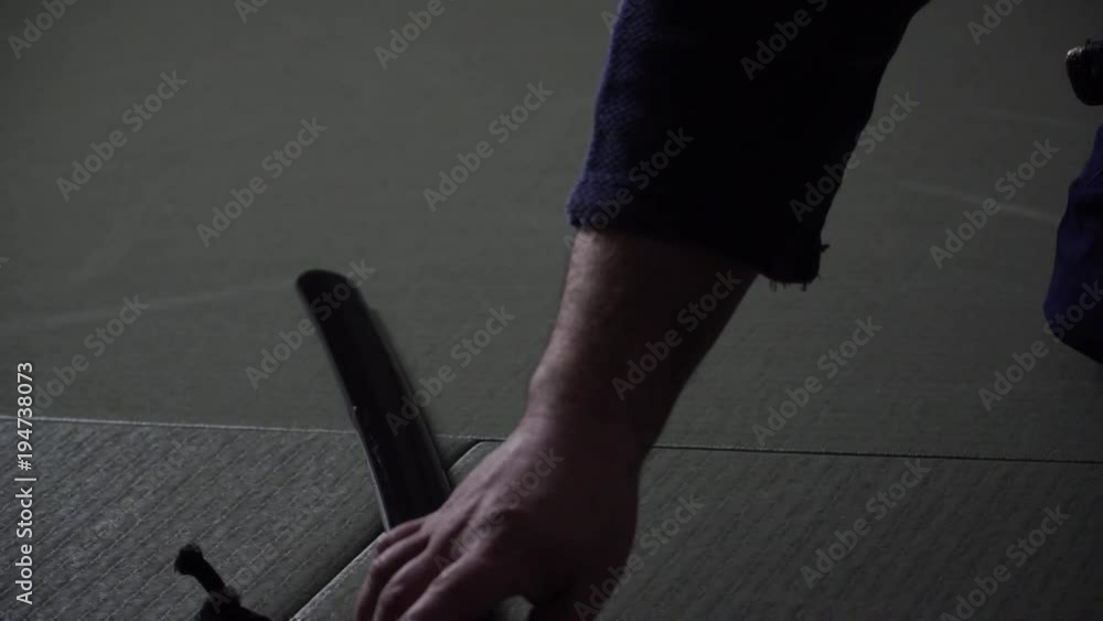 Hand reaching for sword Stock Video | Adobe Stock