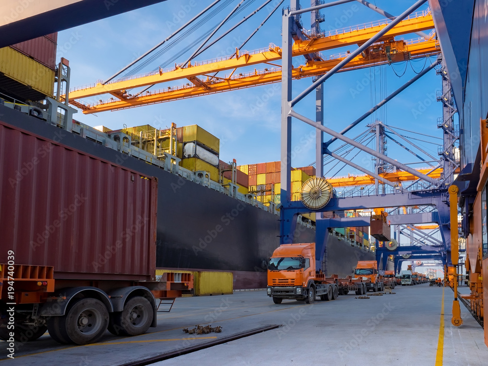 The container vessel during discharging at an industrial port and move ...