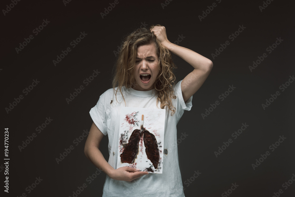 Waist up portrait of girl standing with image of sick lungs and ...