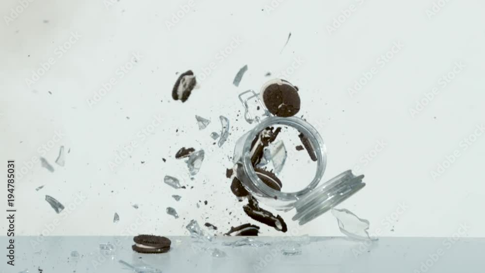 Oreo cookies and broken glass falling, Ultra Slow Motion vídeo do Stock ...