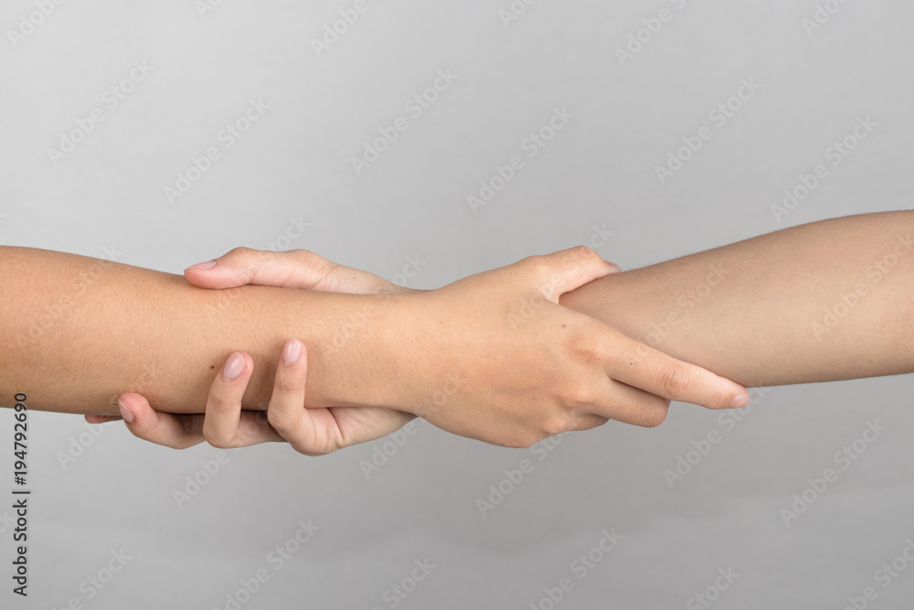 Rescuing and helping by holding or gripping the forearm.Hand and arm ...