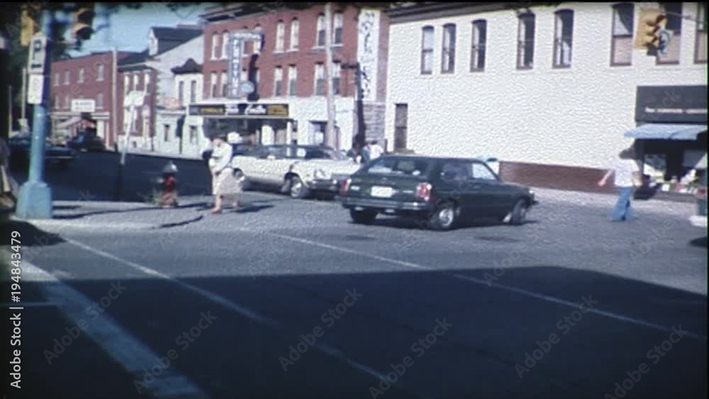 Downtown intersection in a small city in the 1970's. Stock ビデオ | Adobe ...