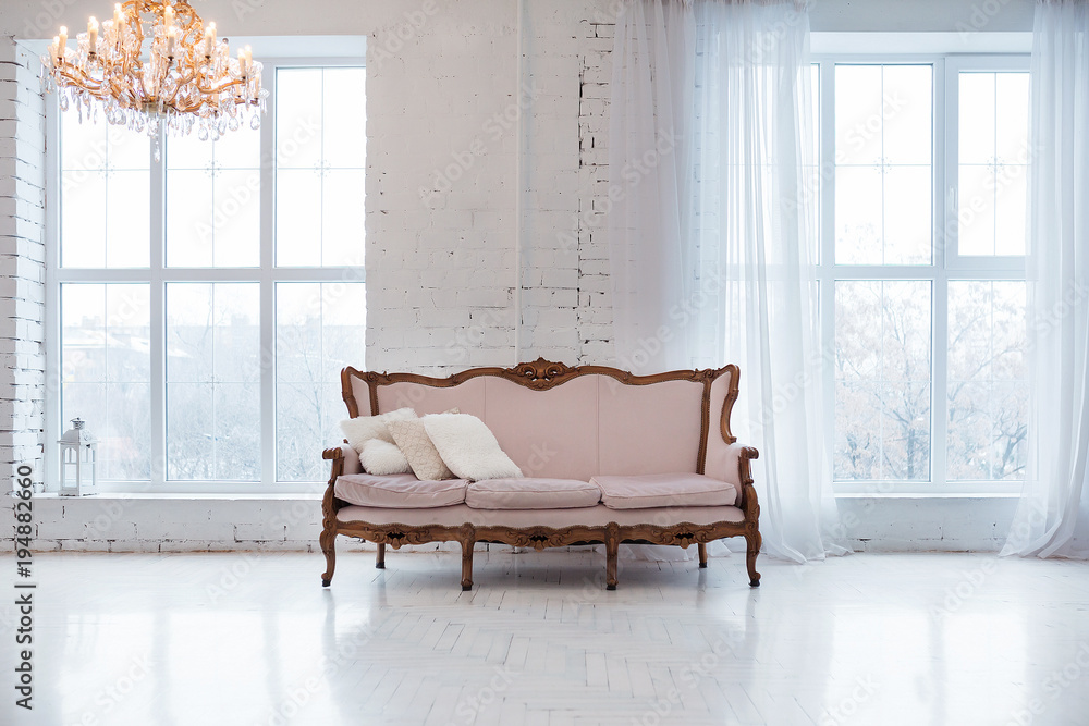Vintage style sofa in loft interior room with big window. Stock Photo ...