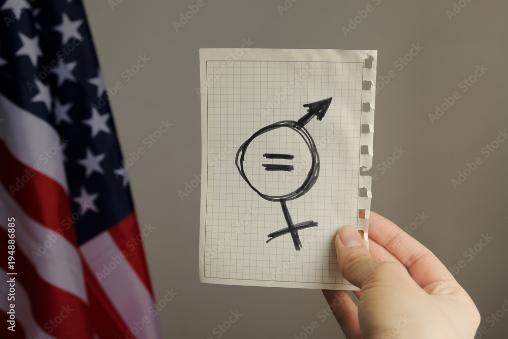 equals sign and a male symbol drawn on a piece of paper depicting the ...