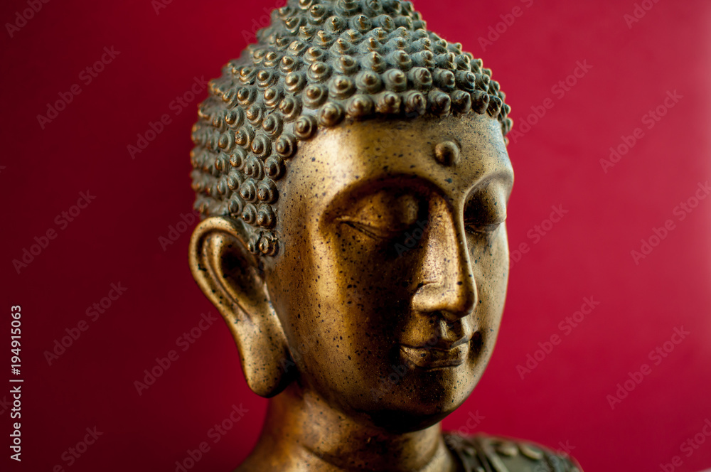 buda con fondo rojo Stock Photo | Adobe Stock