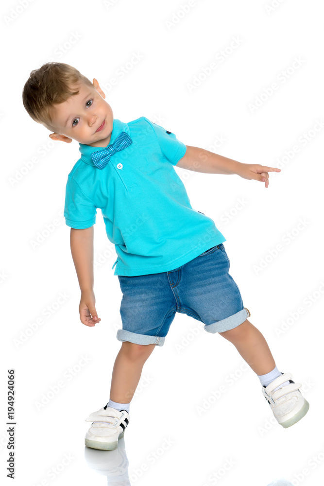 The little boy is emotionally waving his arms. Stock Photo | Adobe Stock