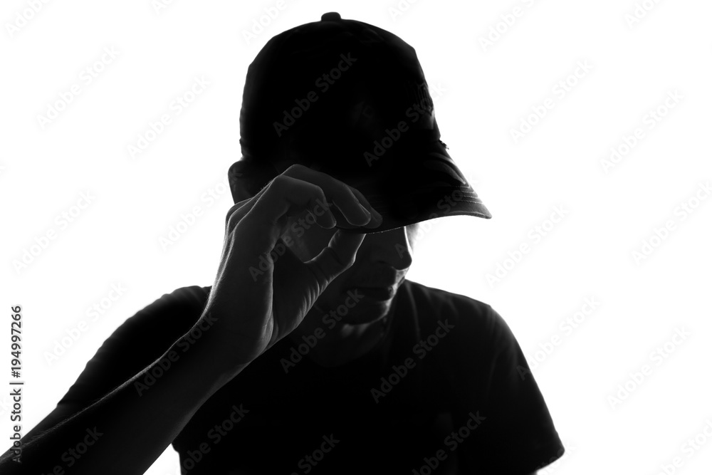 Male person silhouette hidden face under baseball cap over white Stock ...