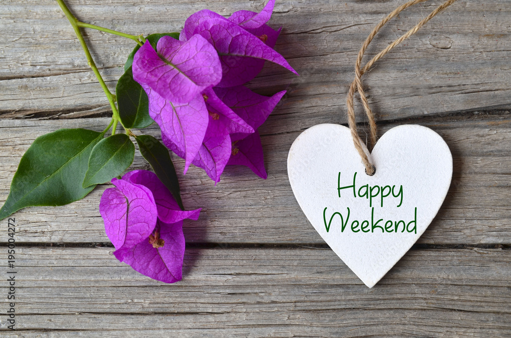 Happy Weekend concept.Bougainvillea flowers and decorative white heart ...