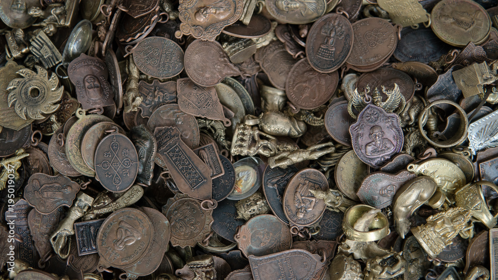 Thai amulets on the market close-up. Religious Buddhist amulets for ...