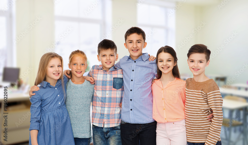 happy students hugging at school Stock Photo | Adobe Stock