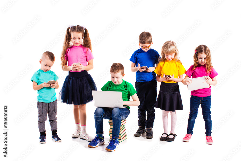 The children with gadgets Stock Photo | Adobe Stock