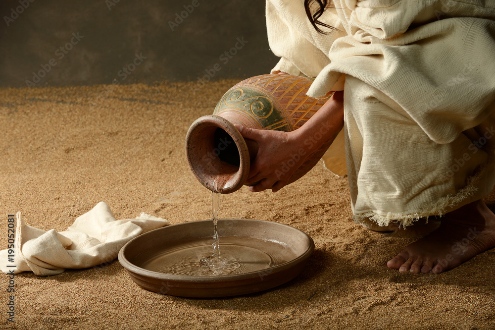 Jesus pouring water Stock Photo | Adobe Stock