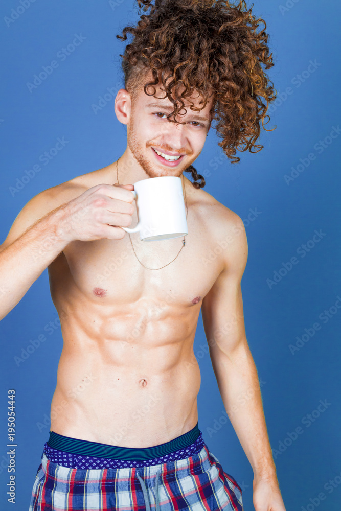 Young athletic ginger man studio portrait Stock Photo | Adobe Stock