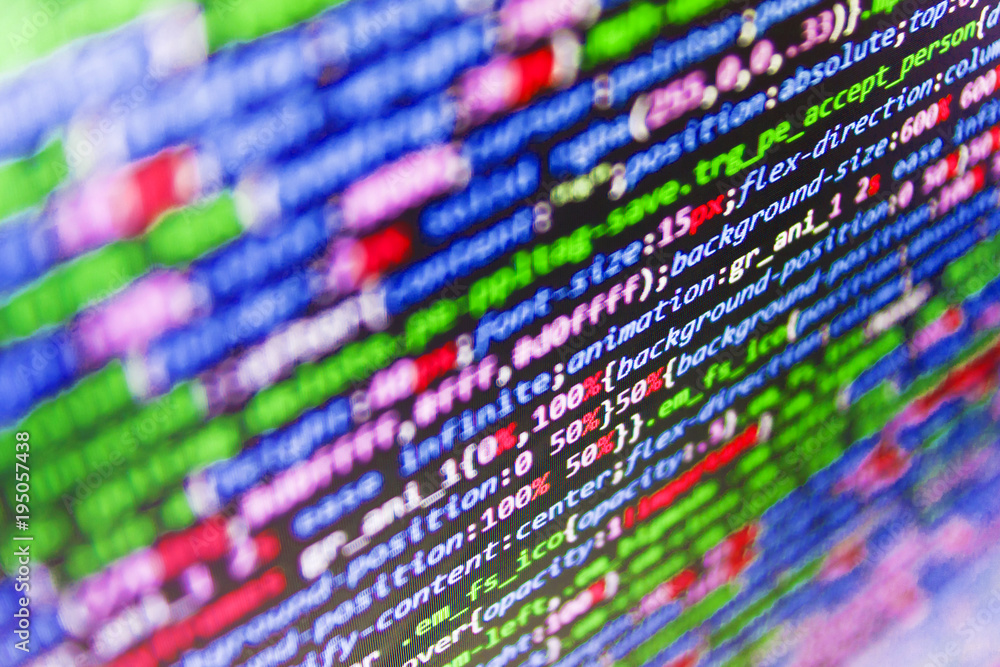 Writing programming code on laptop. Writing programming functions on laptop. Programming code on ...