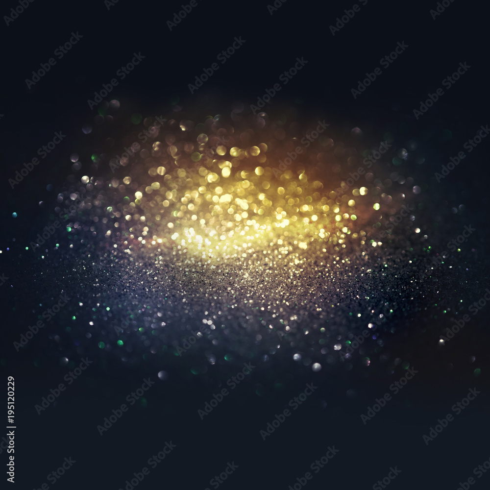 Glitter spectacular colorful dark background black and golg color , de ...