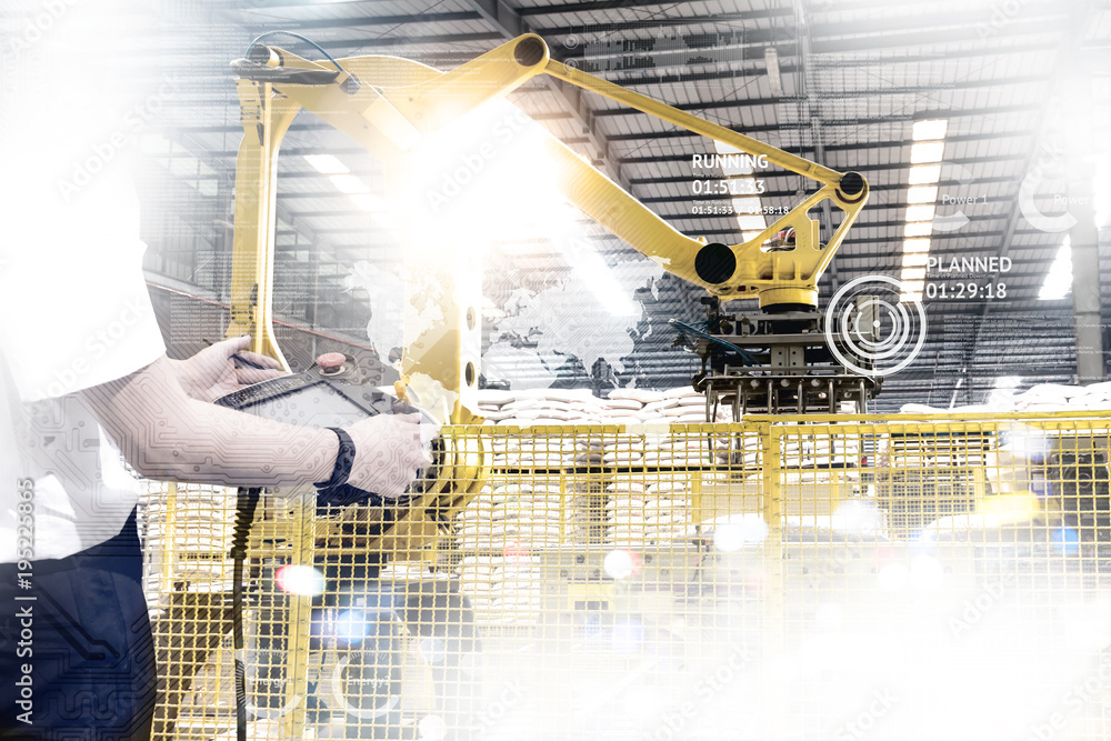 Engineer hand using tablet with machine real time monitoring system ...