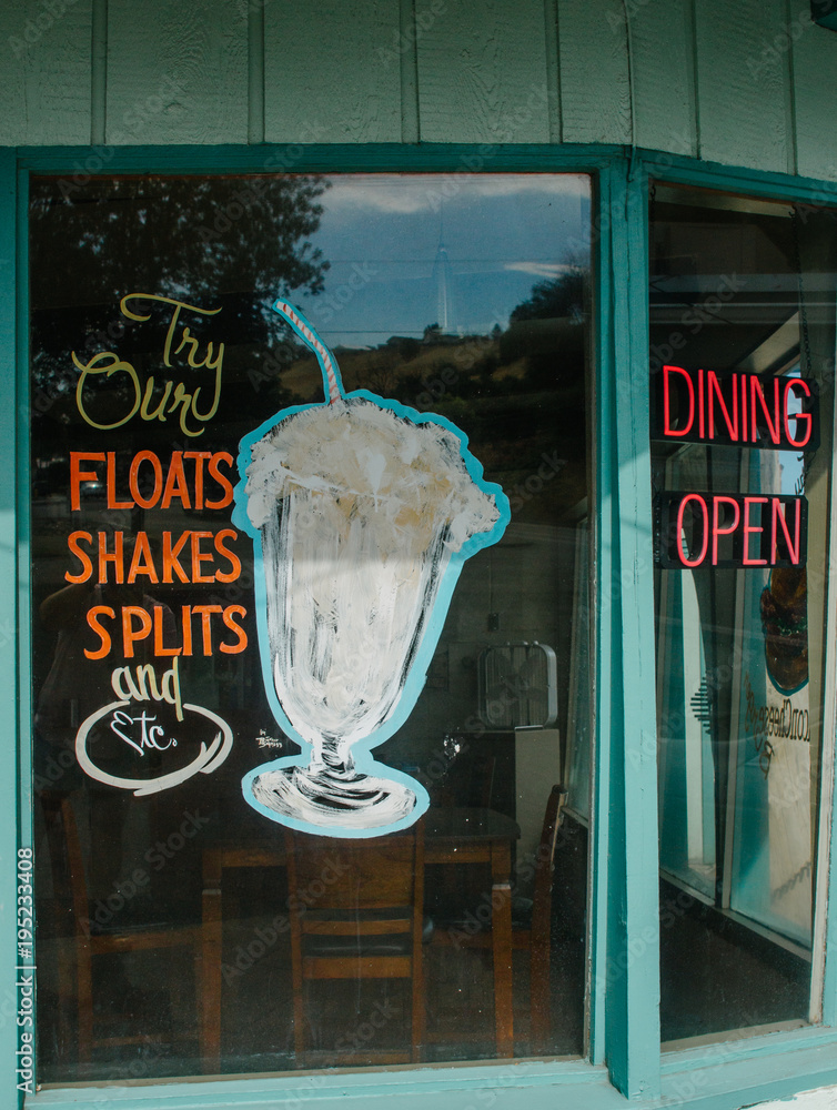 painted window of fast food drive thru Stock Photo | Adobe Stock