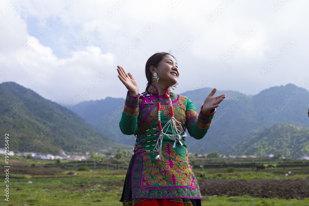 Beautiful Chinese Yi people in traditional costumes outdoor Stock Photo ...