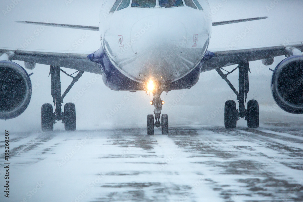 Snow On The Runway With Airplane